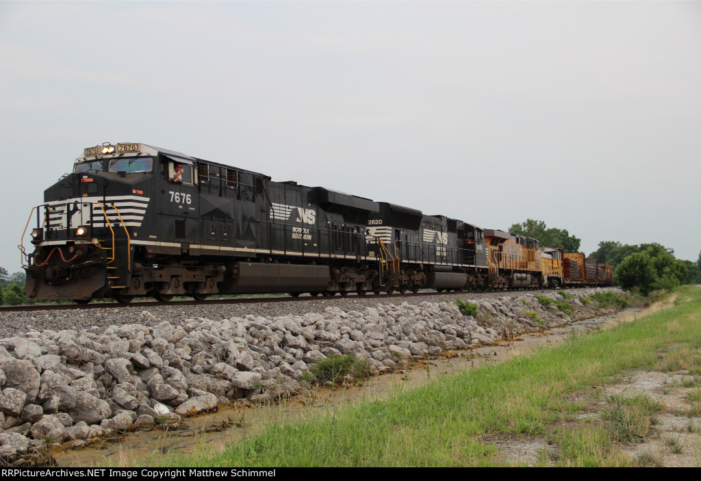 Conductor Pointing Out His Locomotive Lash Up